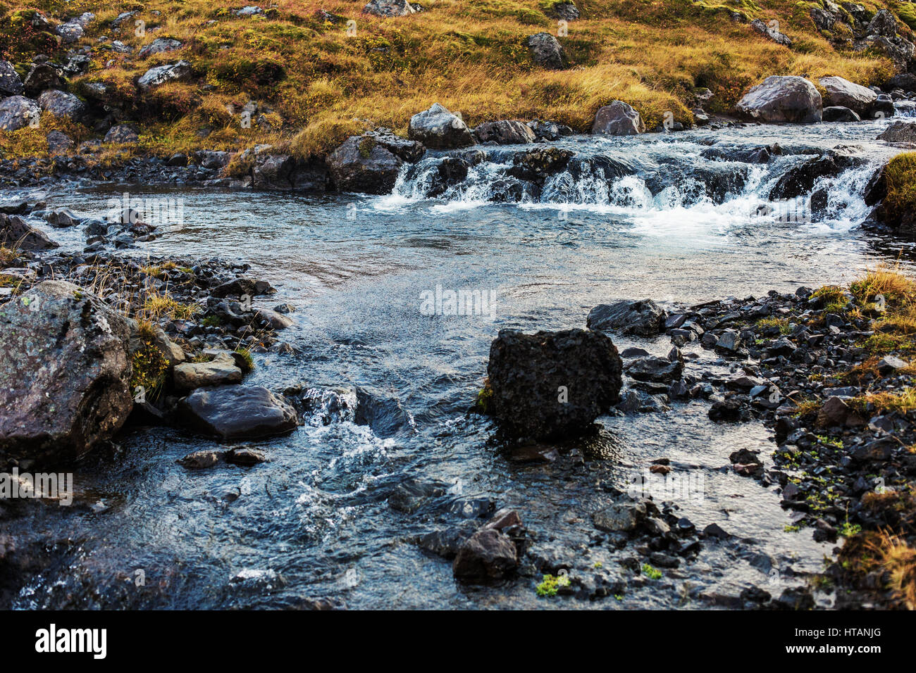 Waters of wild river and stones Stock Photo - Alamy