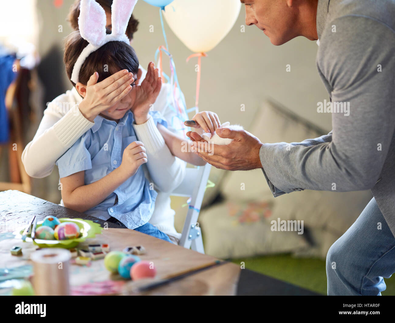 Little boy cuddling fluffy dwarf rabbit - his birthday present Stock ...