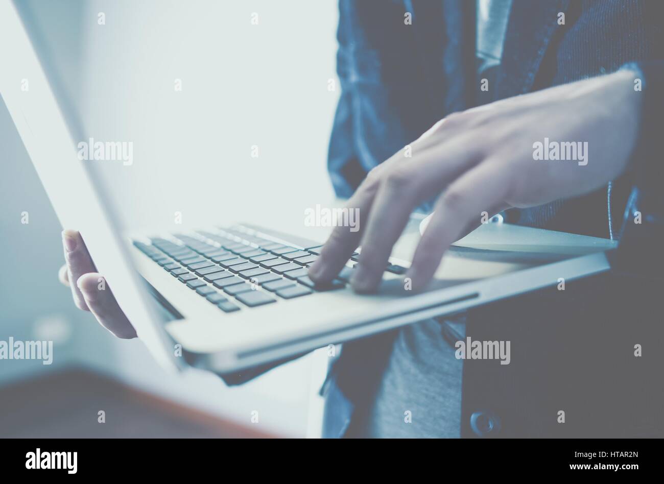 Caucasian Businessman with Laptop Working on While Walking Along the ...