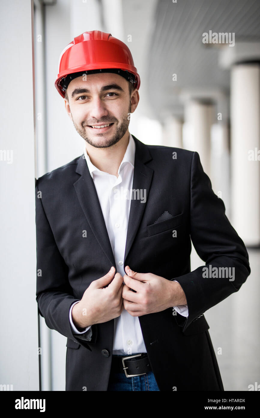 Portrait of an handsome engineer in building Stock Photo - Alamy