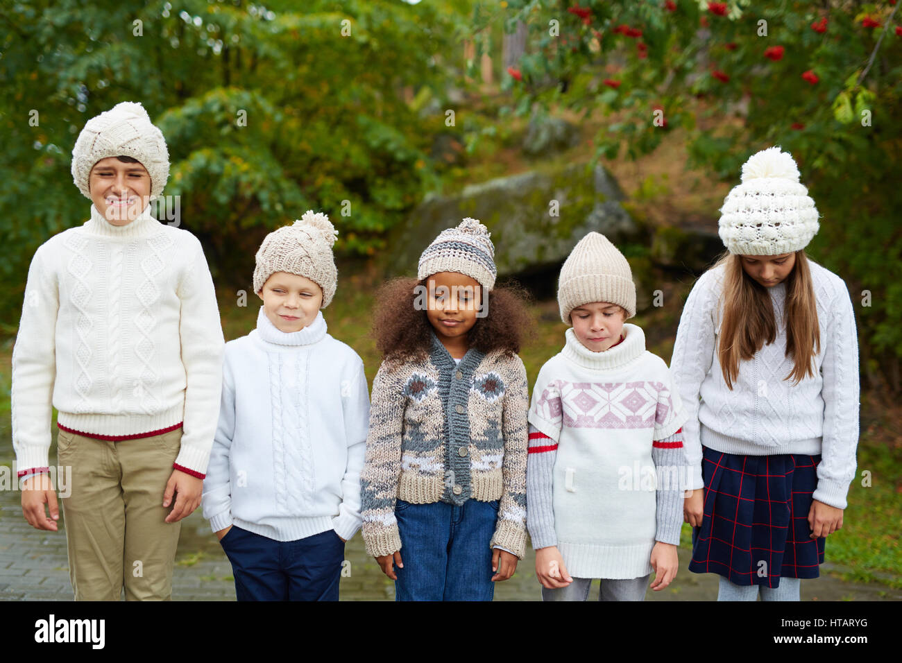 Row of kids with various expressions Stock Photo - Alamy