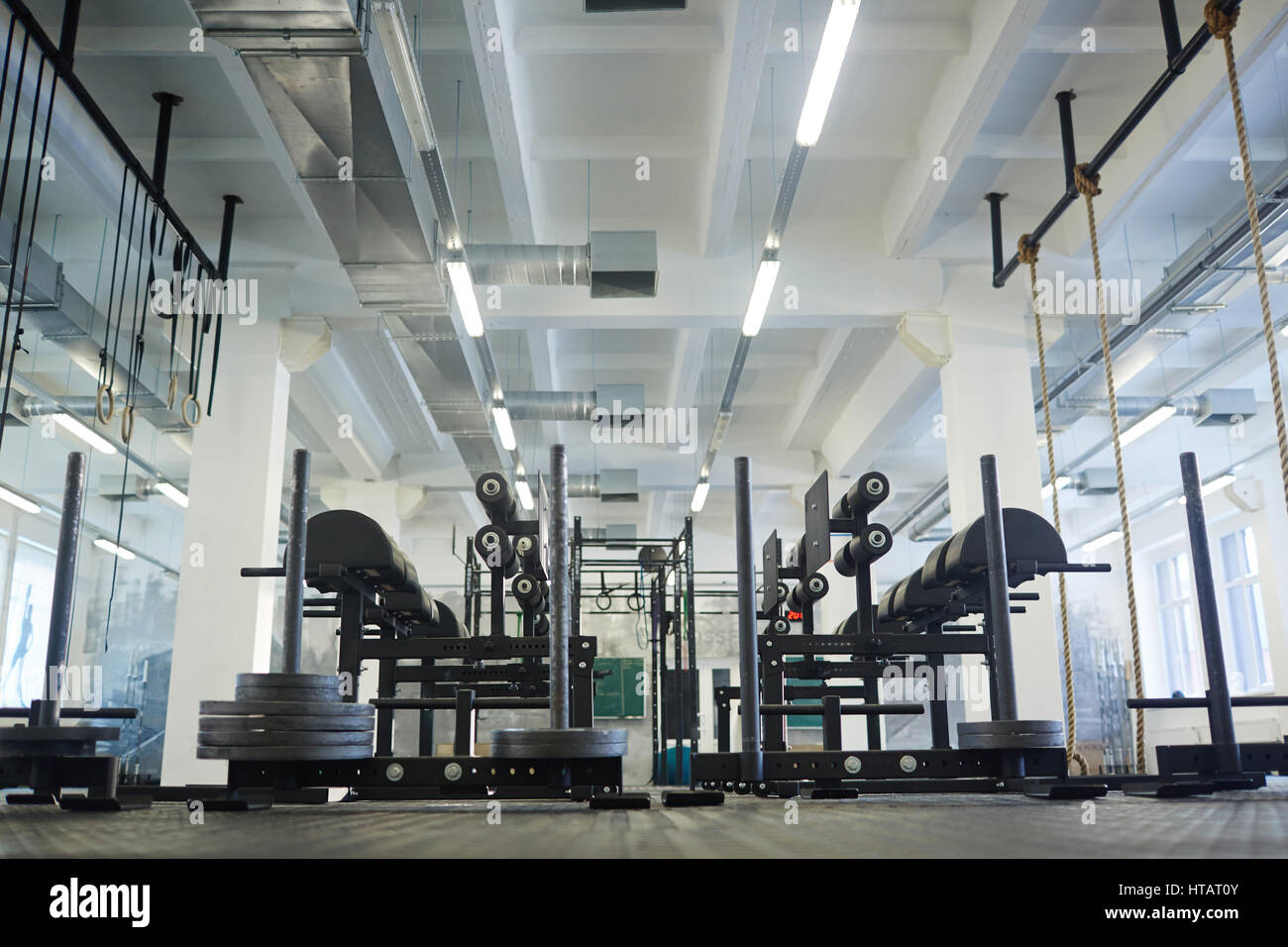 Empty gym with sport equipment Stock Photo - Alamy