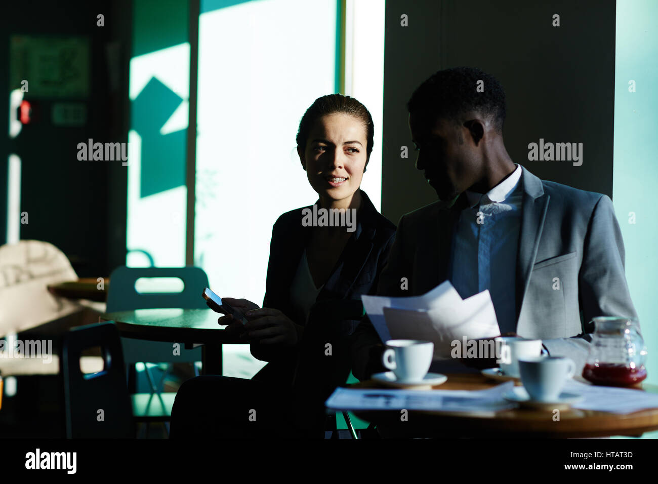 Two business colleagues having talk hi-res stock photography and images ...