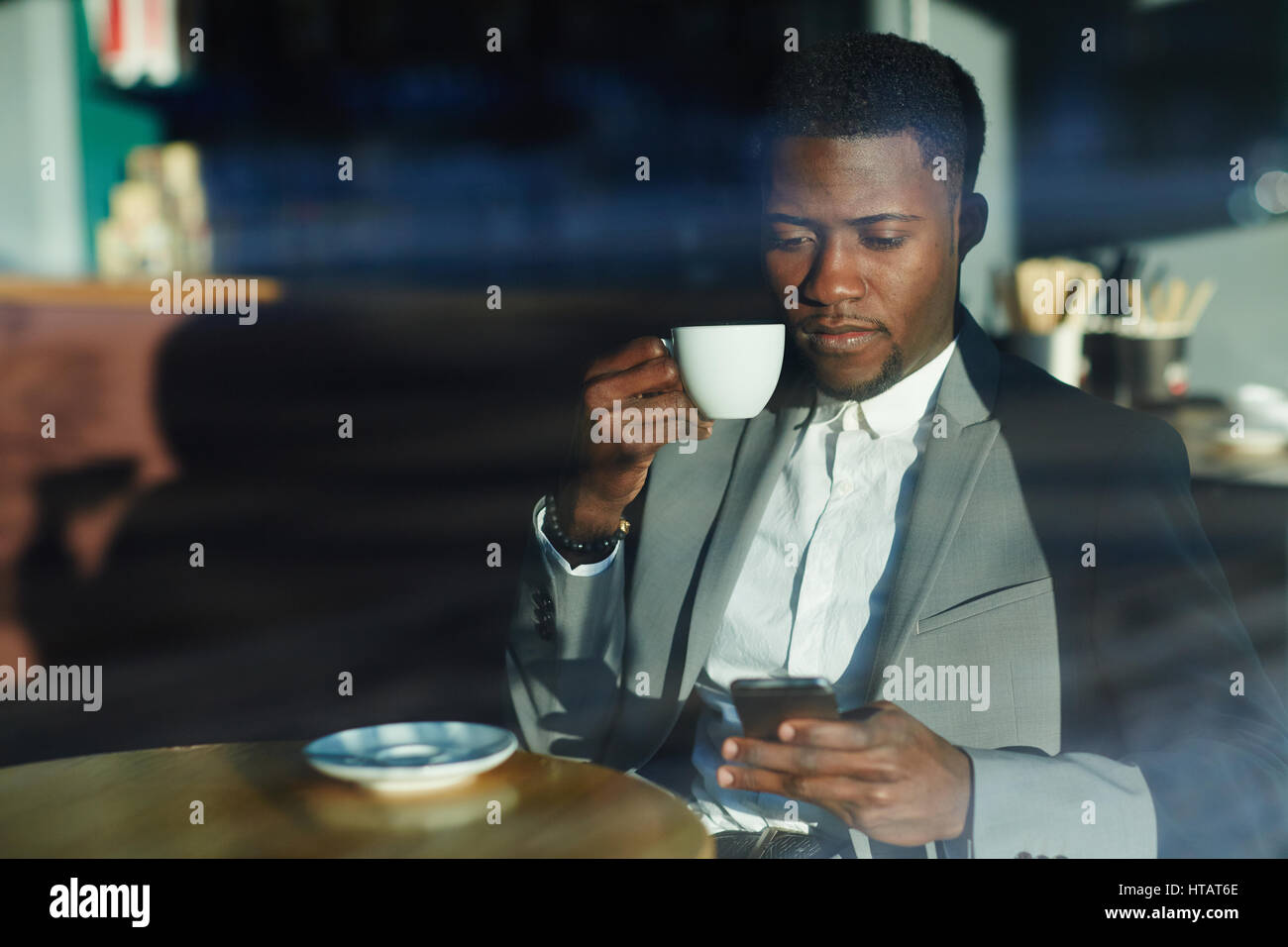 Modern banker sitting in cafe in the morning Stock Photo - Alamy