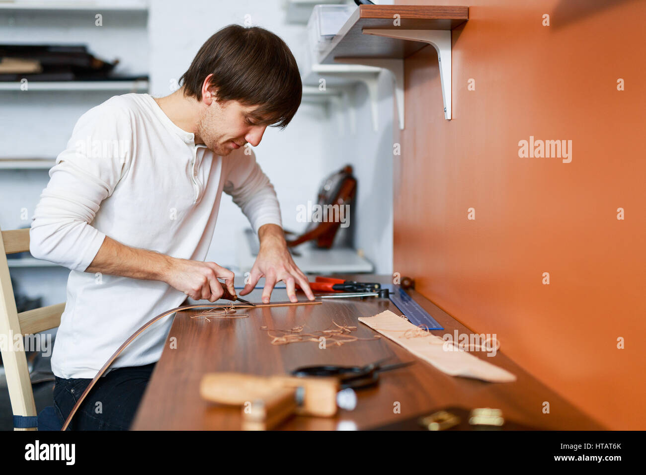 Professional tanner making leather items Stock Photo - Alamy