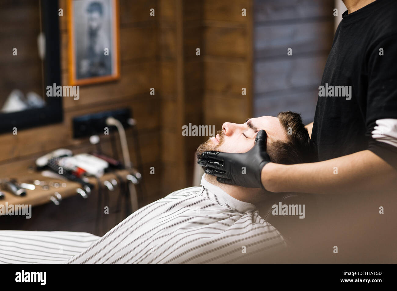 Barber preparing client procedure hi-res stock photography and images ...