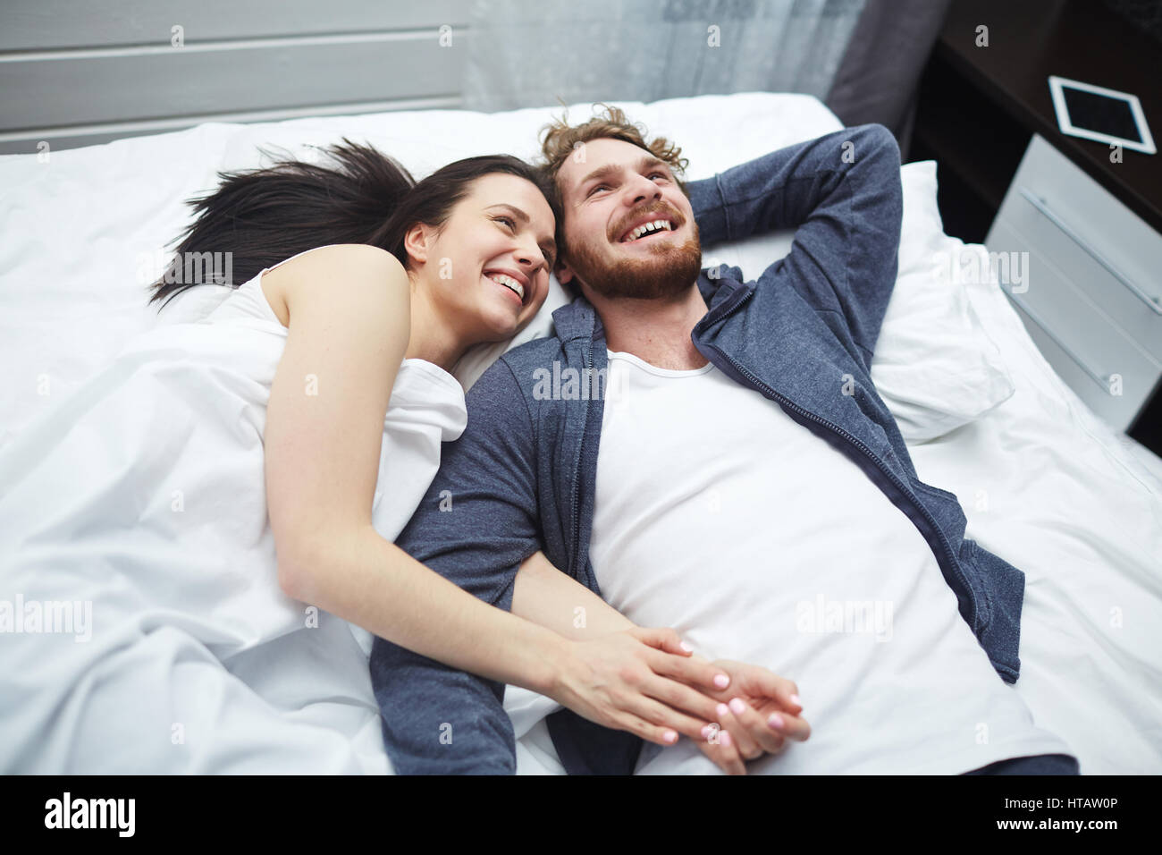 Young couple enjoying relaxing morning hi-res stock photography and ...