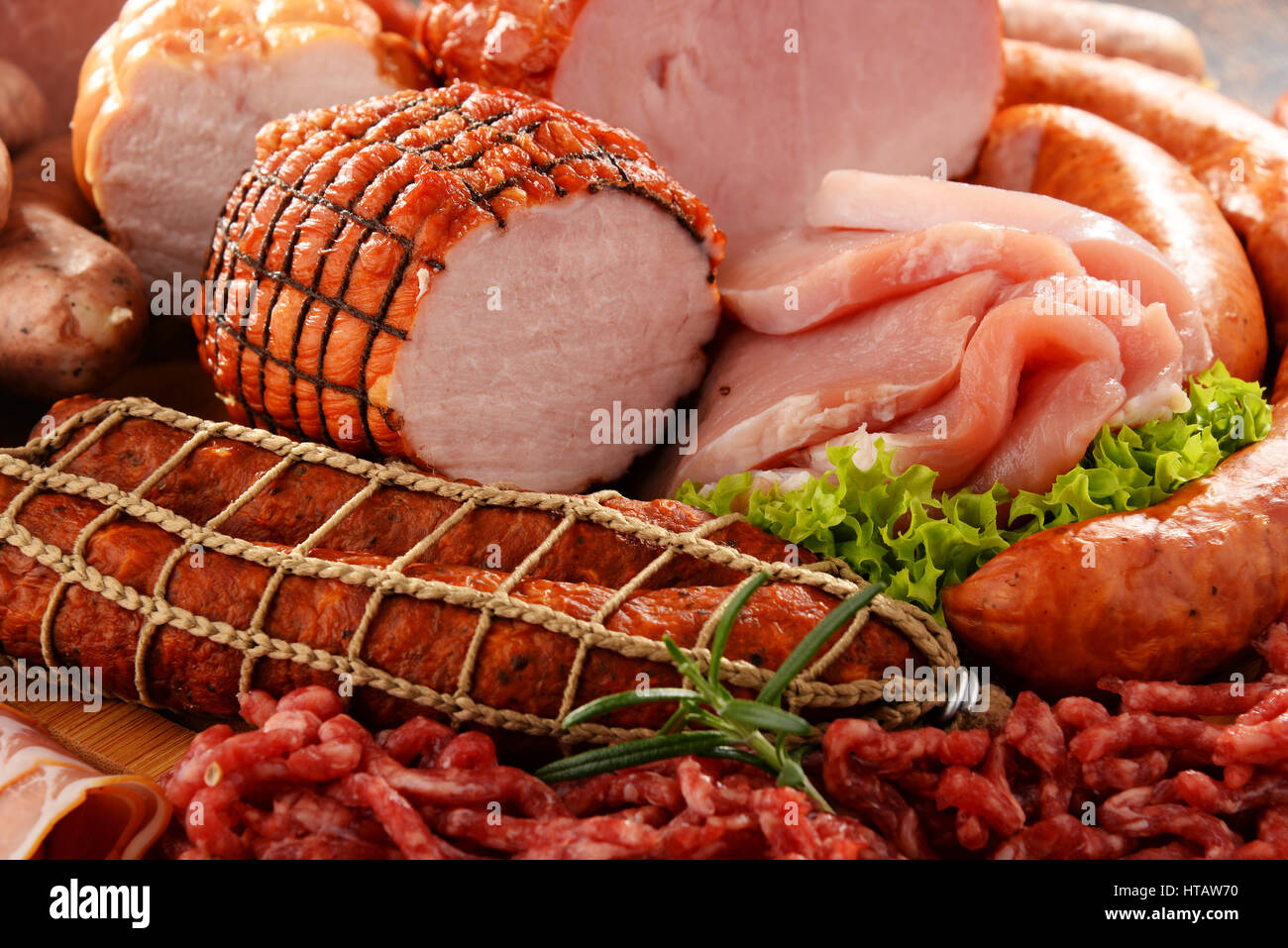 Assorted meat products including ham and sausages Stock Photo - Alamy
