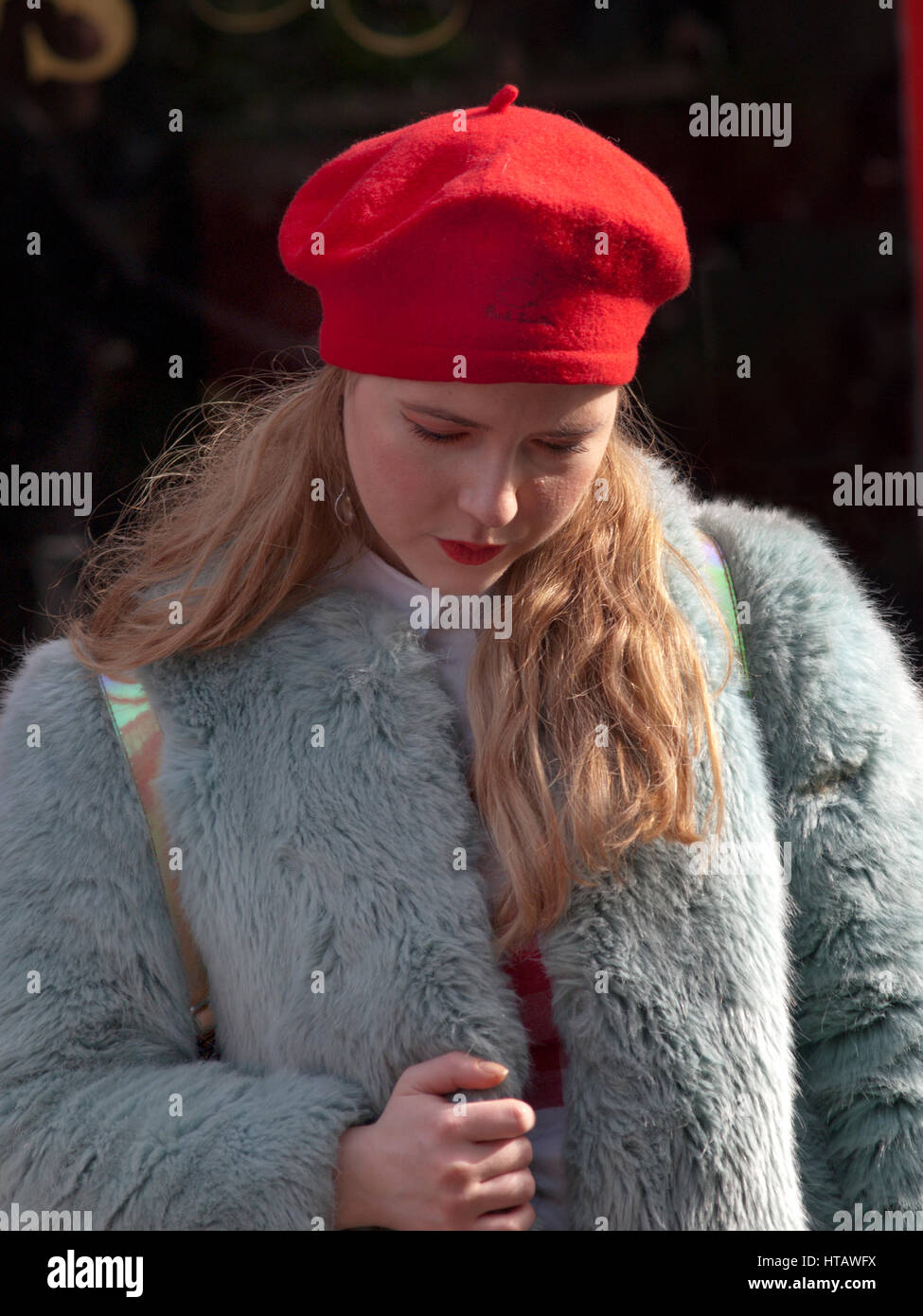 A girl in a bright red beret in Brighton Stock Photo - Alamy