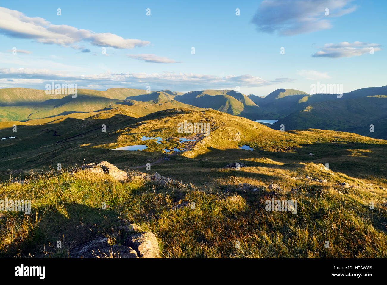 The mountain summit of Place Fell in the Lake District at sunset Stock ...