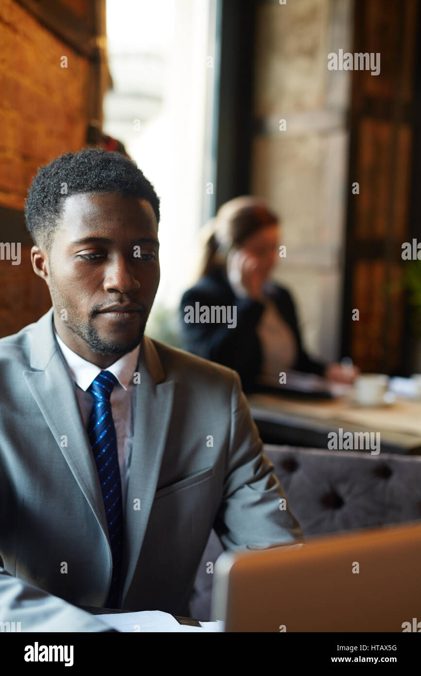 Portrait of rich successful African American man wearing business suit ...