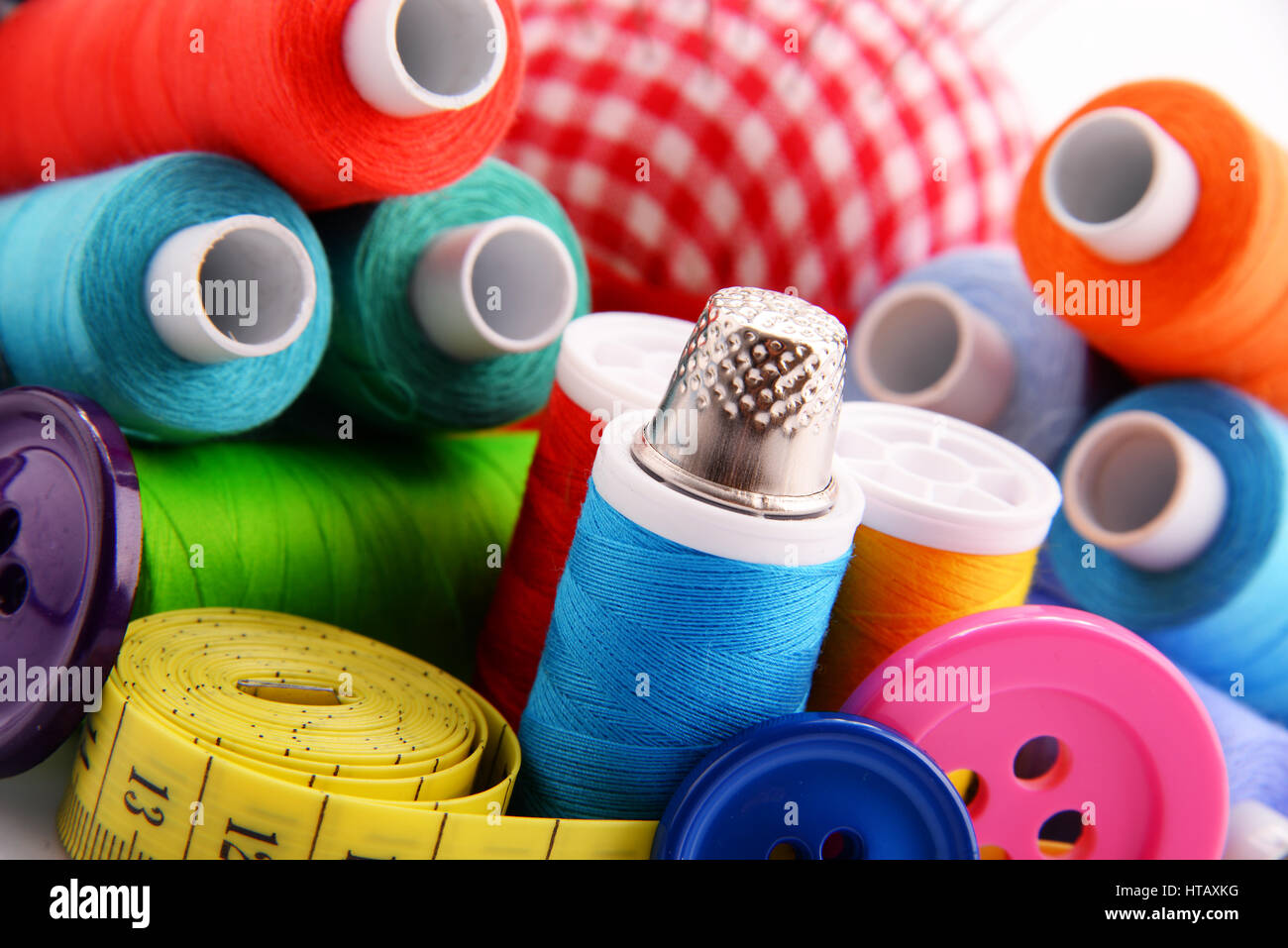 Composition with tailor threads and buttons Stock Photo - Alamy