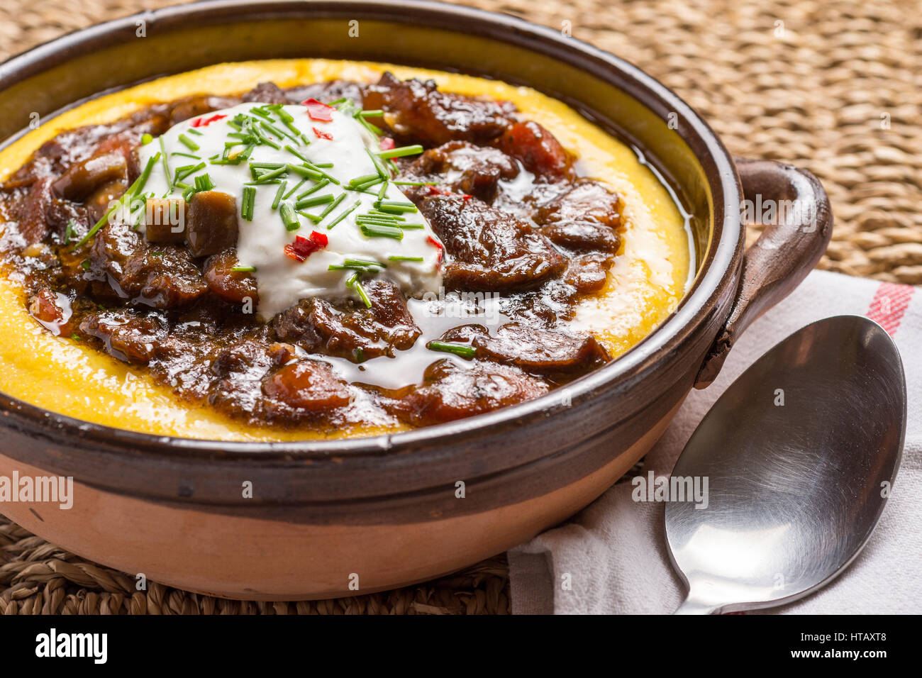 Beef Stew with Mushrooms, Carrots and Corn Polenta Stock Photo - Alamy