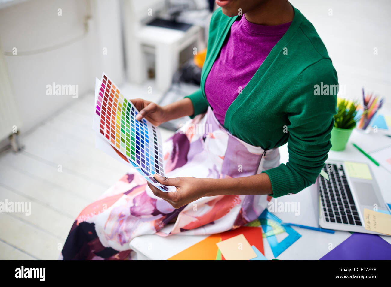 Creative girl working with color palette Stock Photo - Alamy