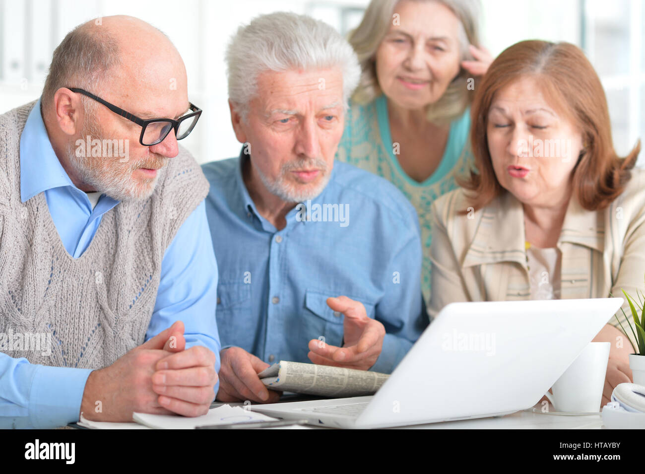 Portrait of older people with a laptop Stock Photo - Alamy
