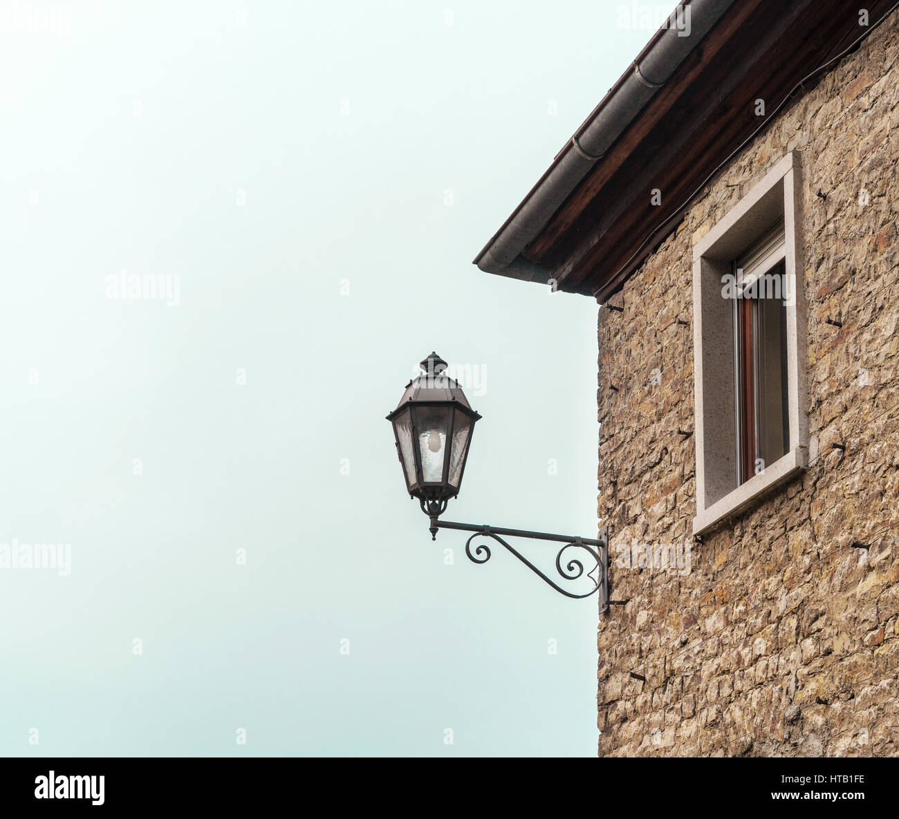 Old lamp on a house Stock Photo - Alamy