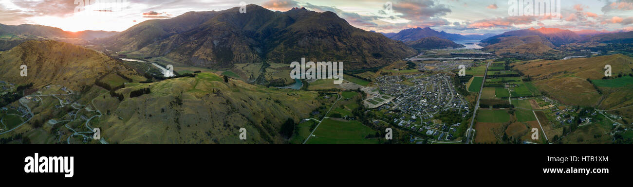 Aerial panoramic view of Queenstown and Remarkables mountains and Lake ...