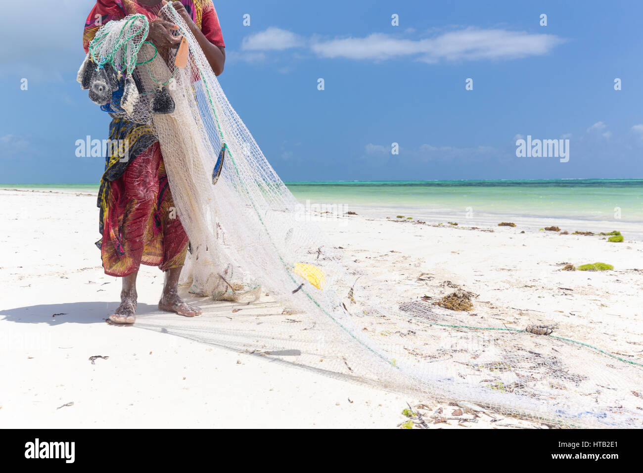 Traditional african local rural fishing on Paje beach, Zanzibar ...
