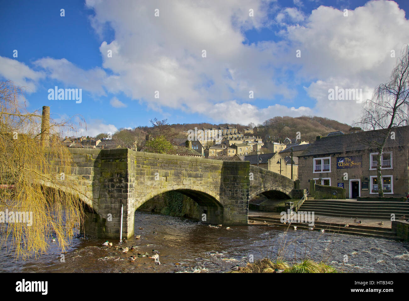 The ancient packhorse bridge over the river Wharfe in Hebden Bridge ...