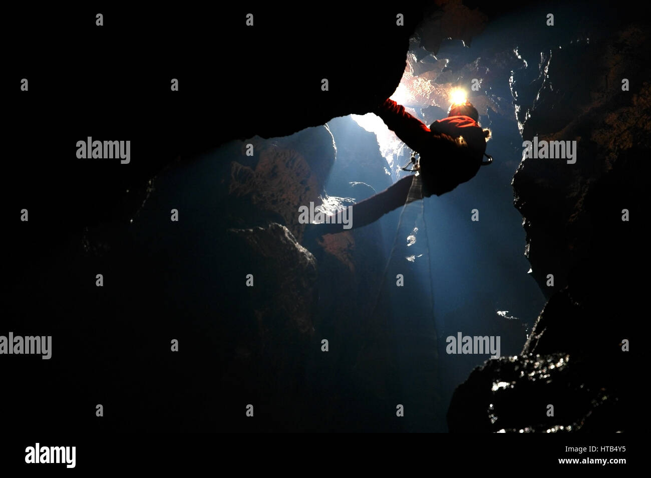 Spelunker with light hi-res stock photography and images - Alamy