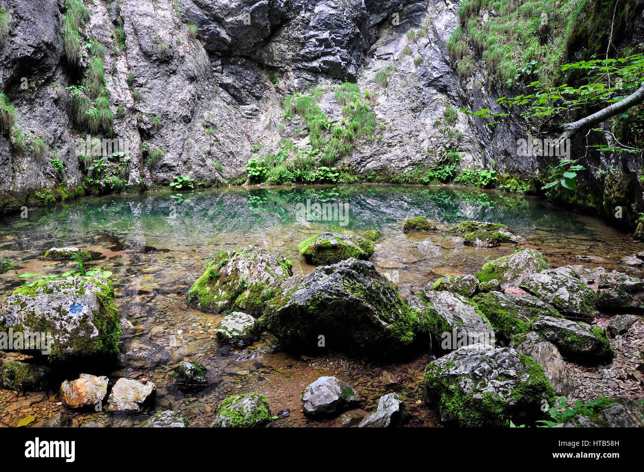 Deep underground spring from a cave Stock Photo - Alamy