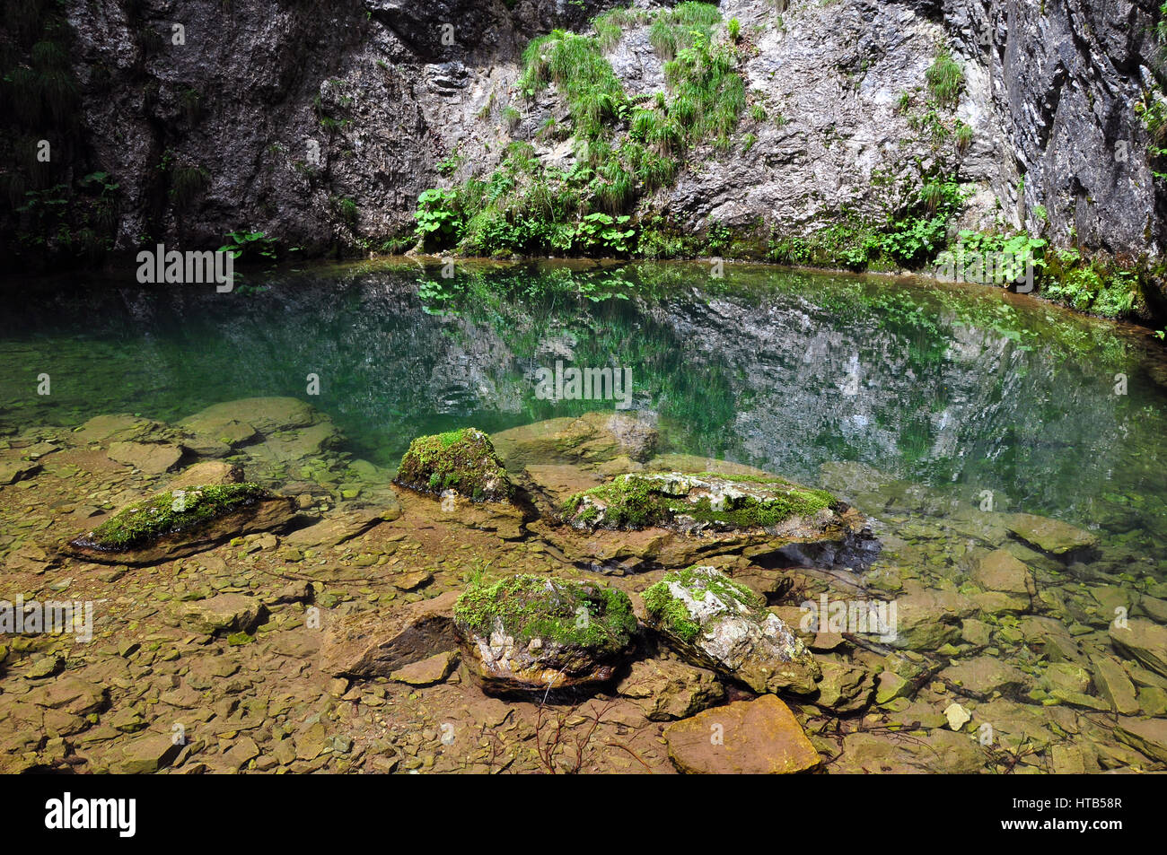 Deep underground spring from a cave Stock Photo - Alamy