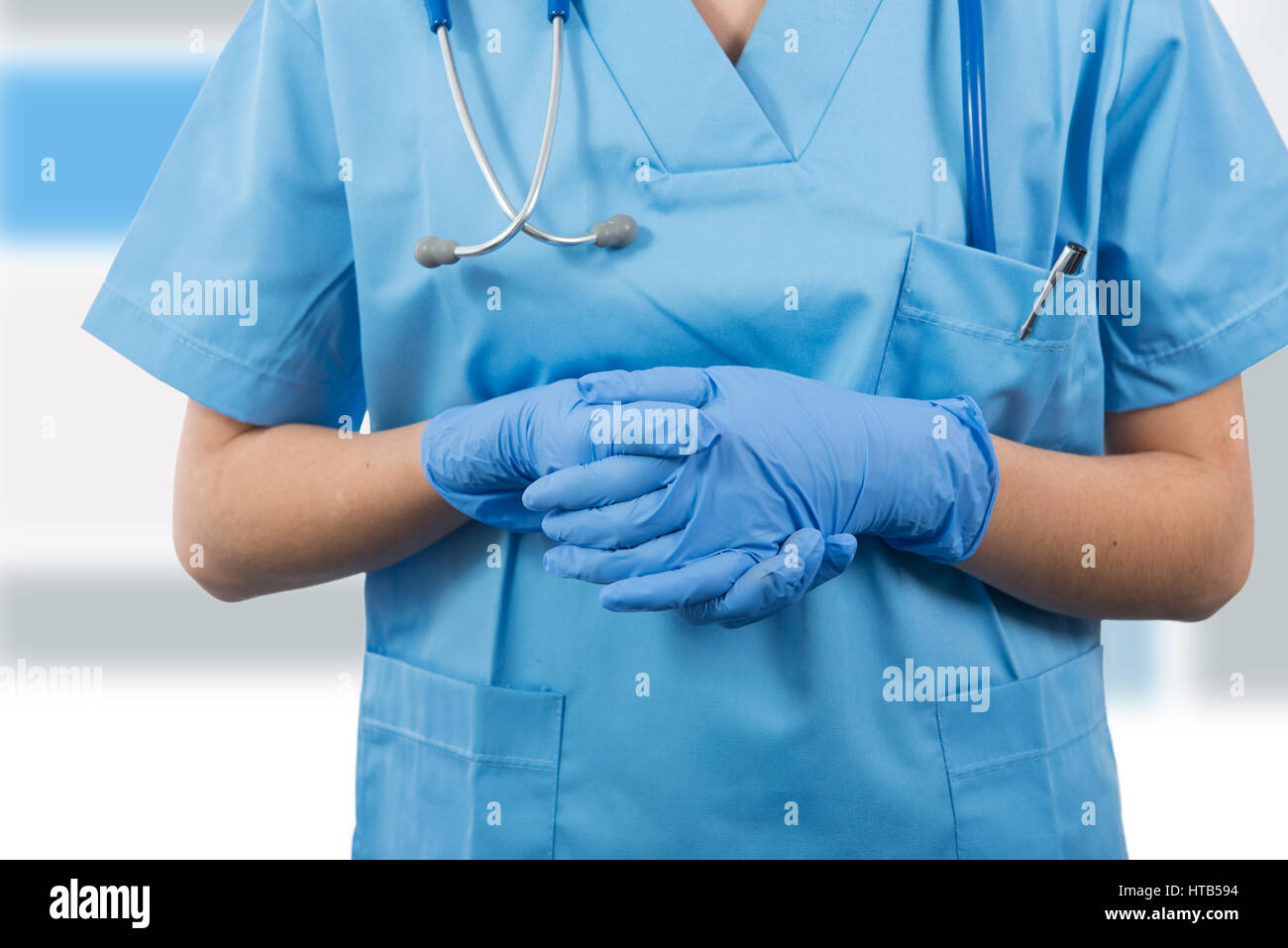the doctor hands in medical gloves closeup Stock Photo - Alamy