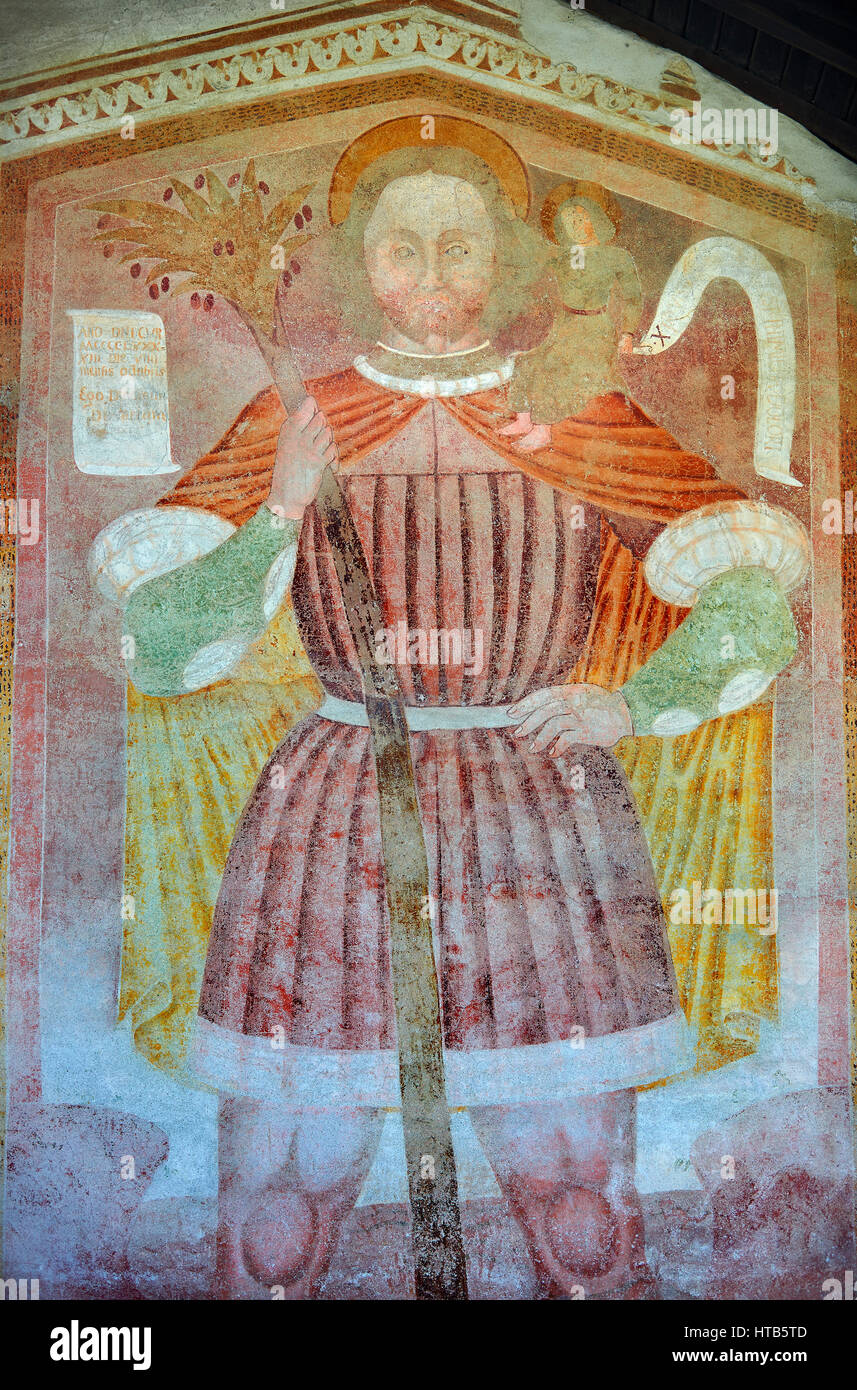 Religious mural of St Christopher with Christ on his shoulders by ...