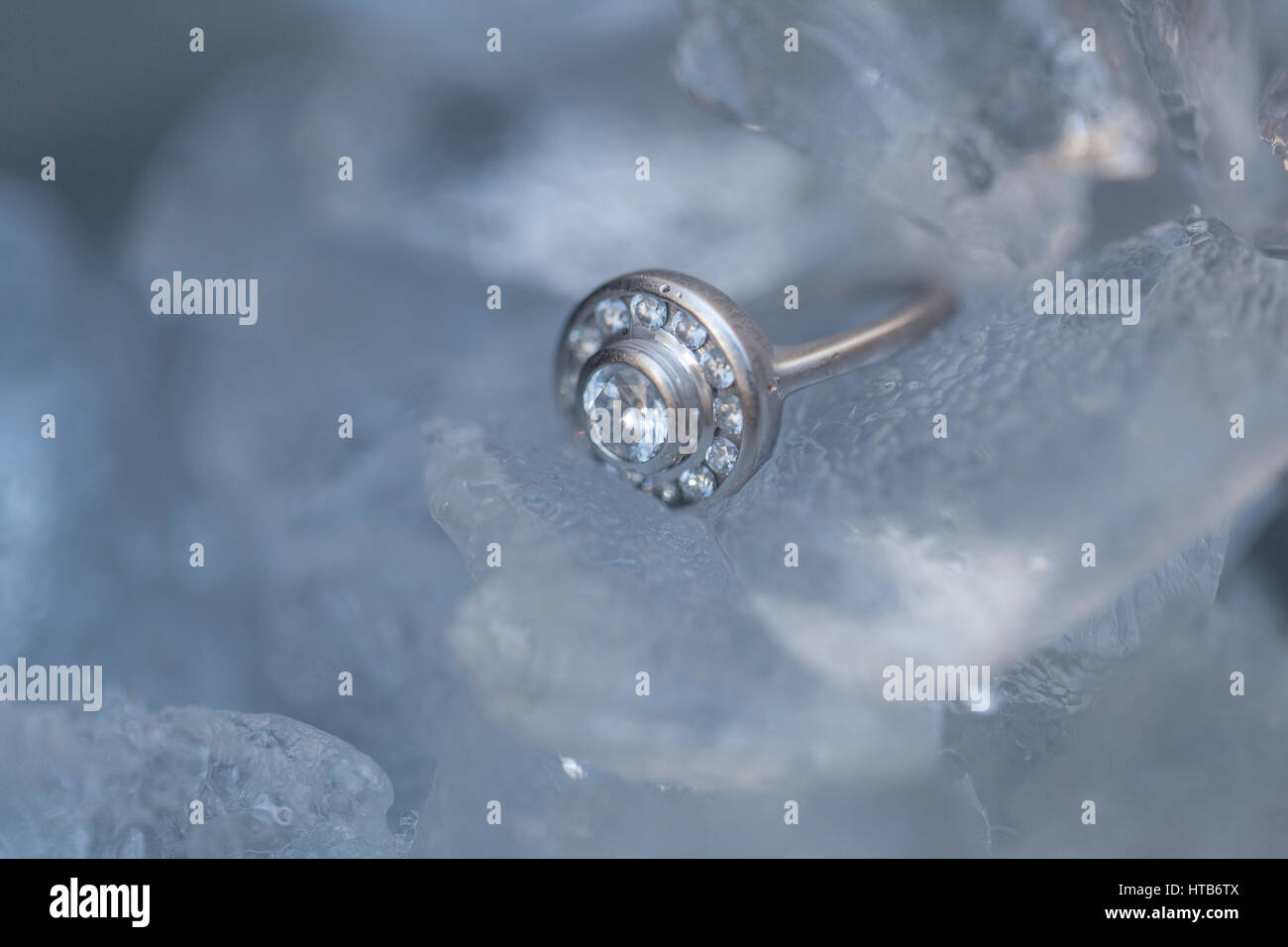 Ring placed in an ice sculpture Stock Photo - Alamy