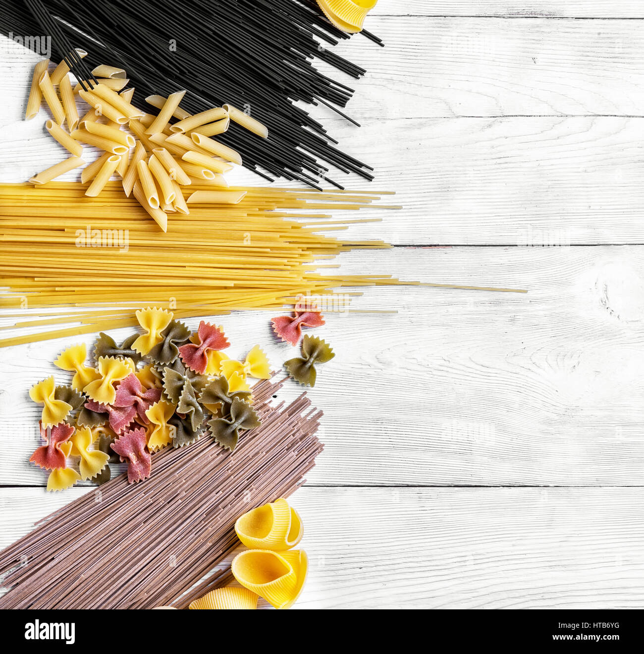 Mixed dried types and shapes of dry Italian pasta Stock Photo - Alamy