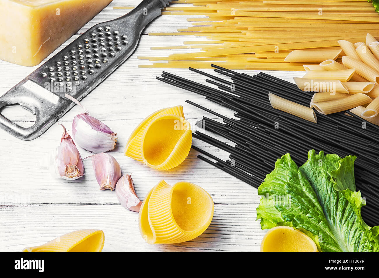 Mixed dried types and shapes of dry Italian pasta Stock Photo - Alamy