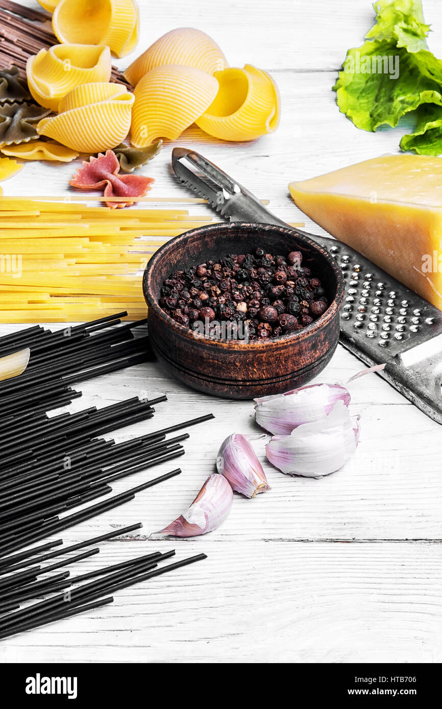 Mixed dried types and shapes of dry Italian pasta Stock Photo - Alamy
