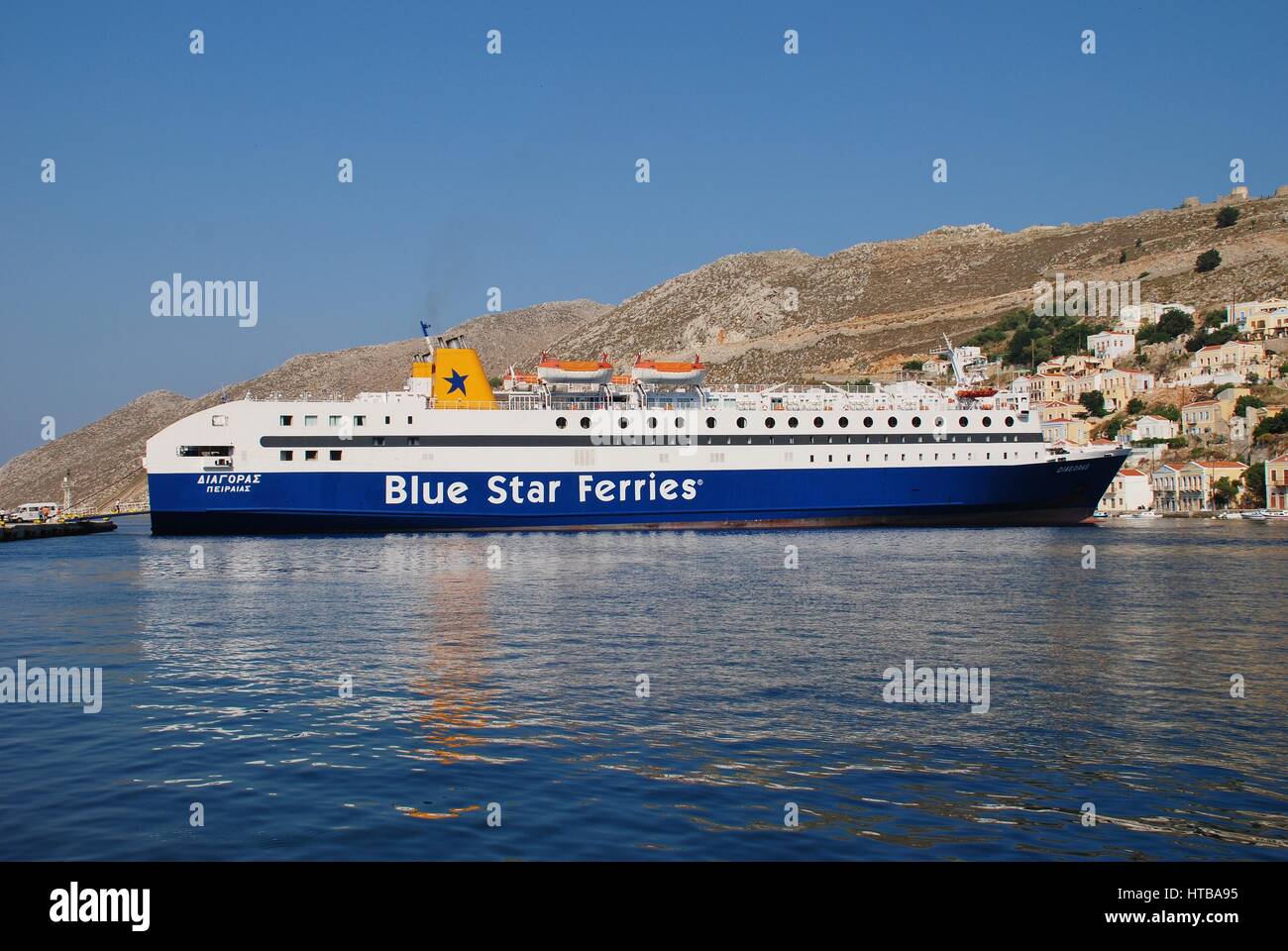 Blue Star Ferries ferry boat Diagoras docking at Yialos harbour on the ...