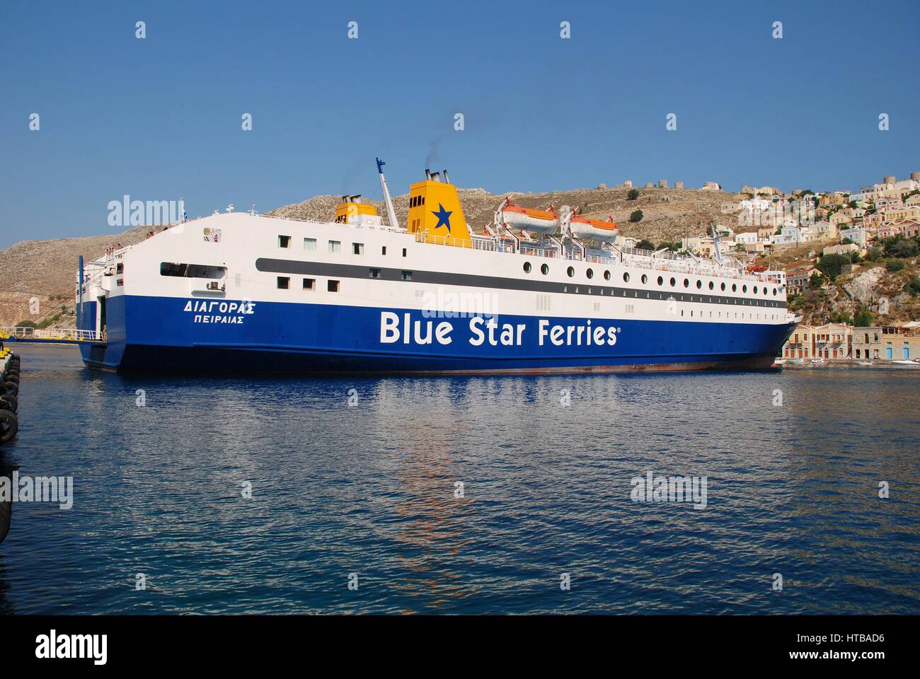 Blue Star Ferries ferry boat Diagoras docking at Yialos harbour on the ...