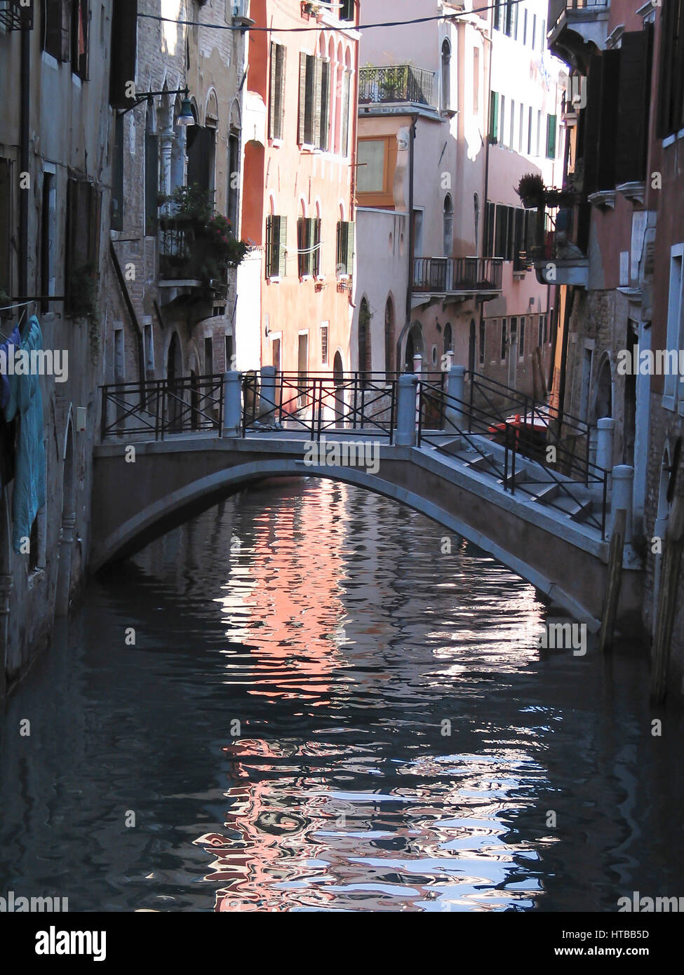 Reflections on the tranquil canal of Venice, showcasing picturesque ...
