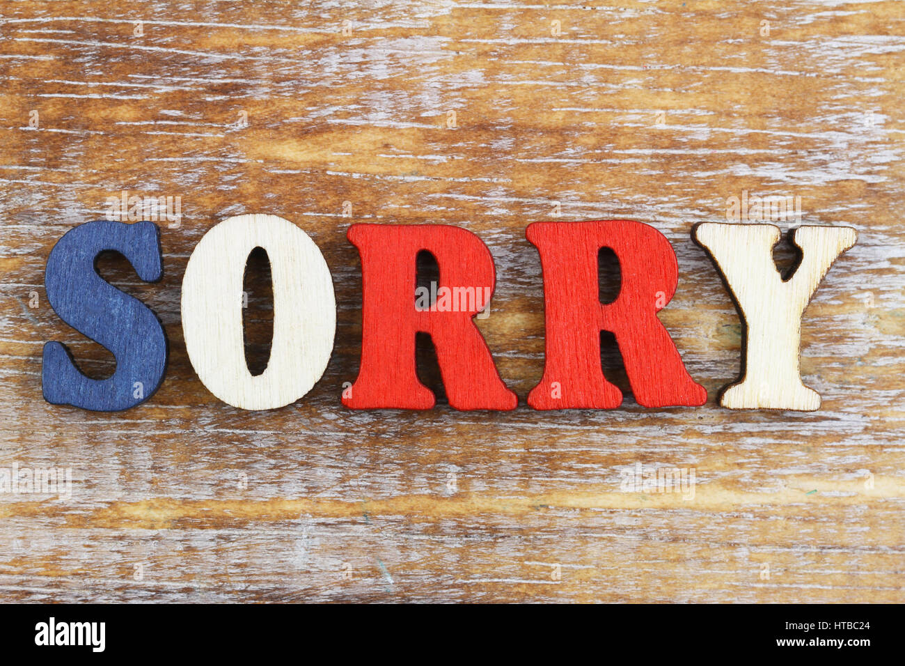 Word sorry written with colorful wooden letters Word sorry written with ...