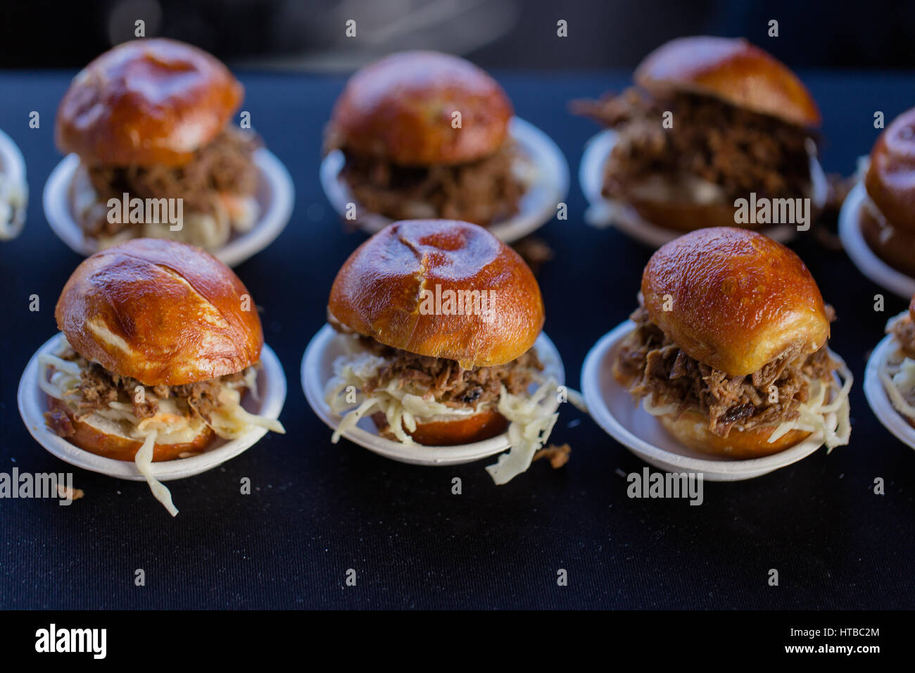 rows of mini sliders/miniature burgers Stock Photo - Alamy