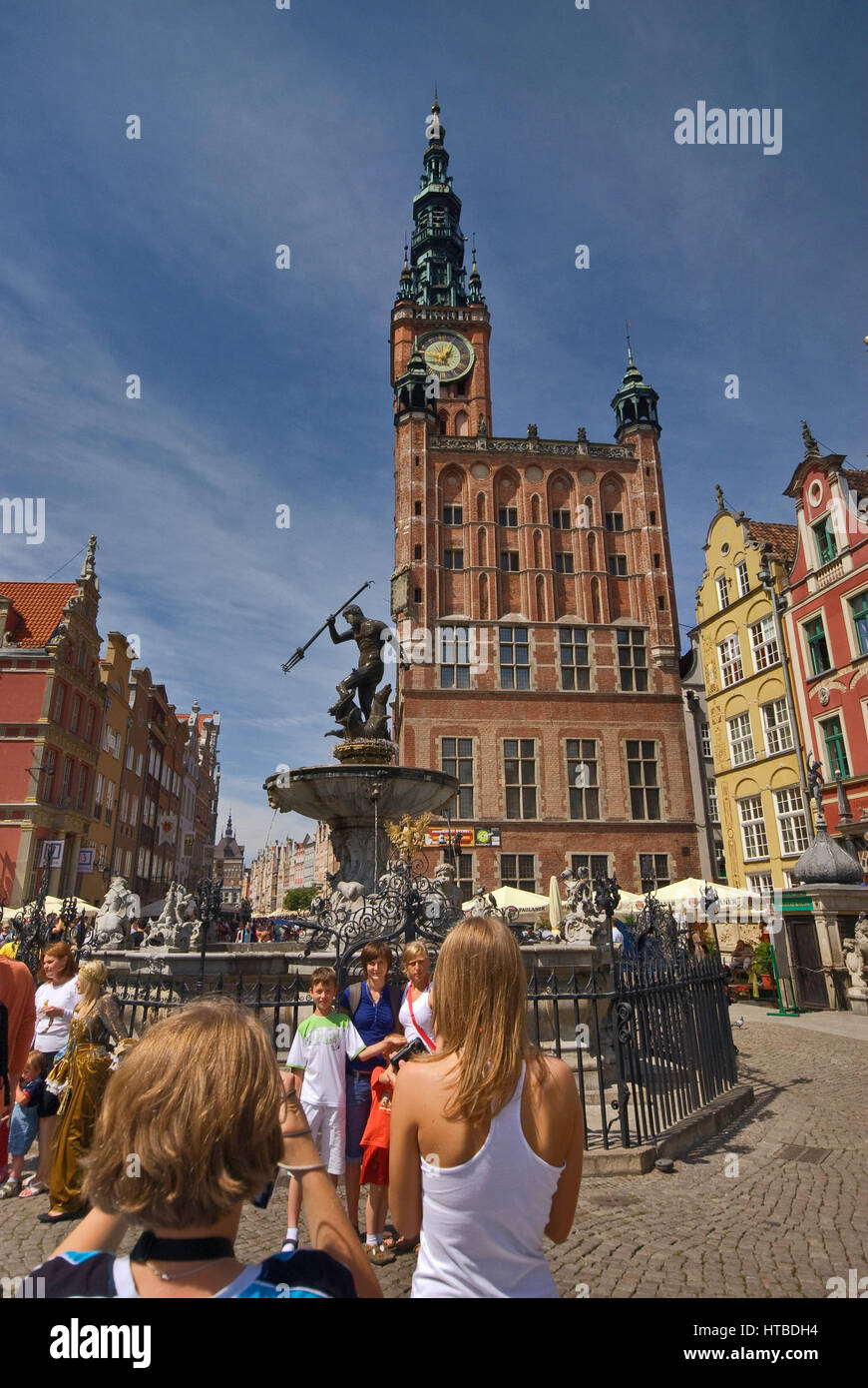 Tourists at Neptune Fountain, Dlugi Targ (Long Market) in Gdansk ...