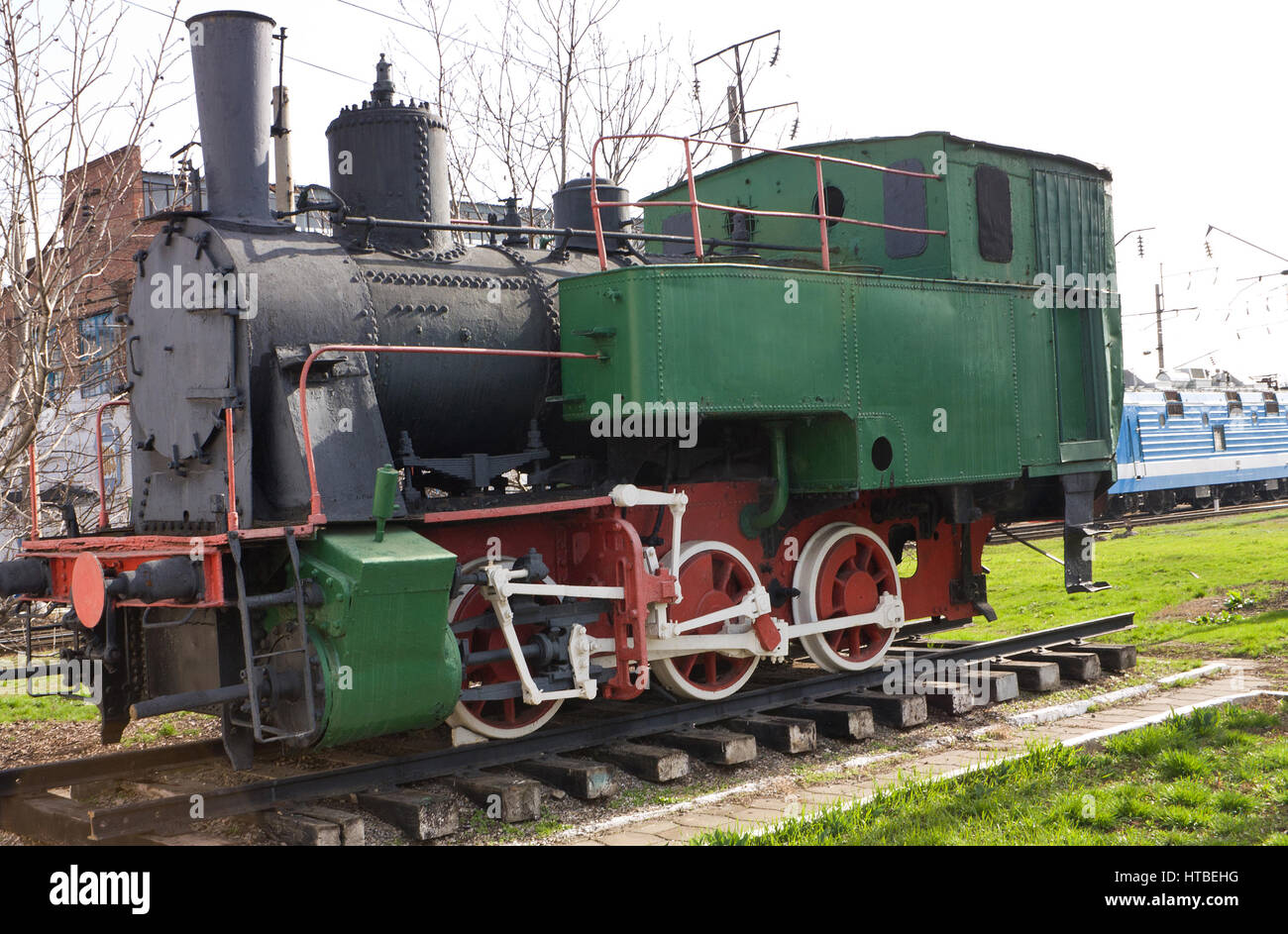 Small green old steam locomotive Stock Photo - Alamy