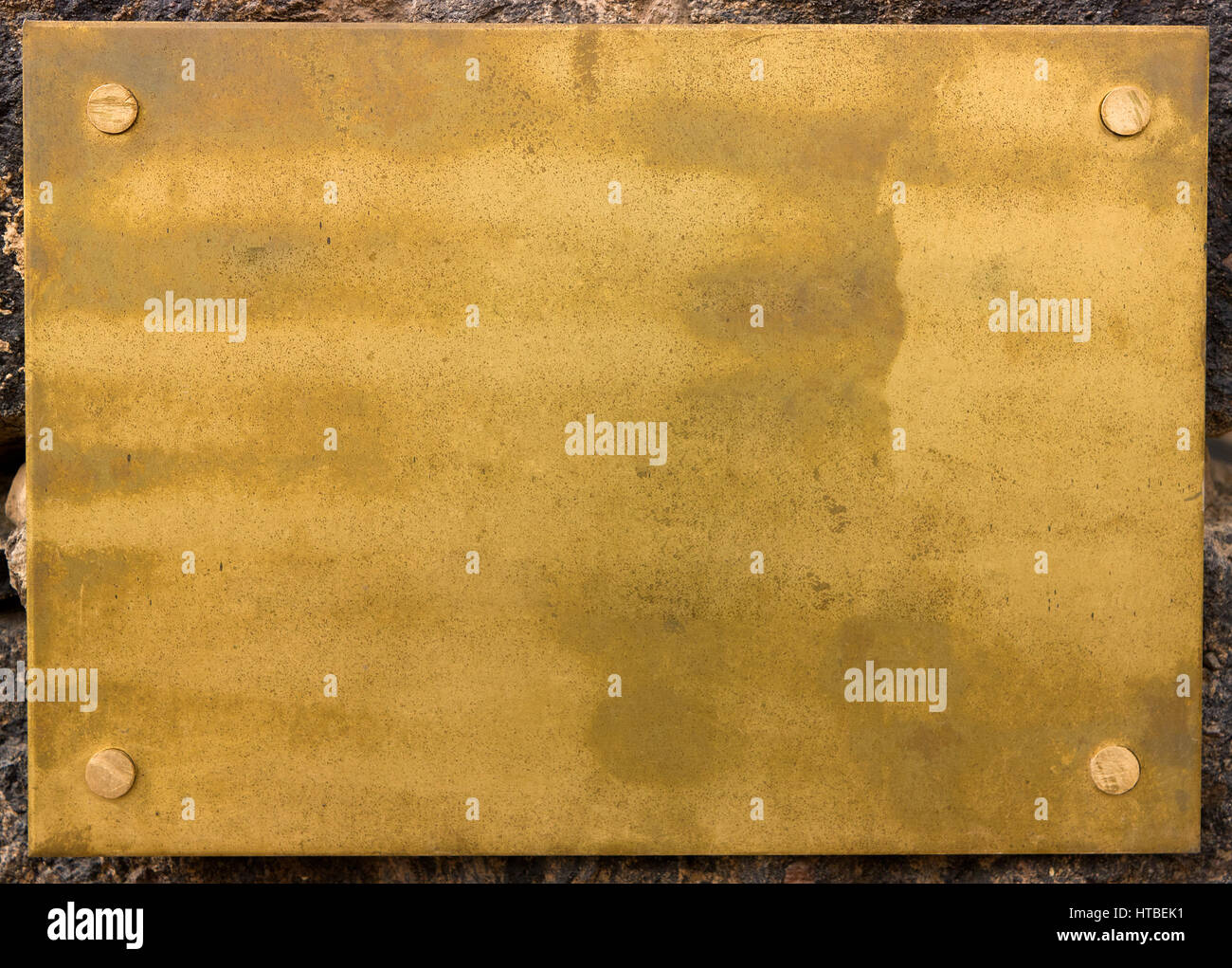 Old memorial metal board fixed to the wall Stock Photo - Alamy