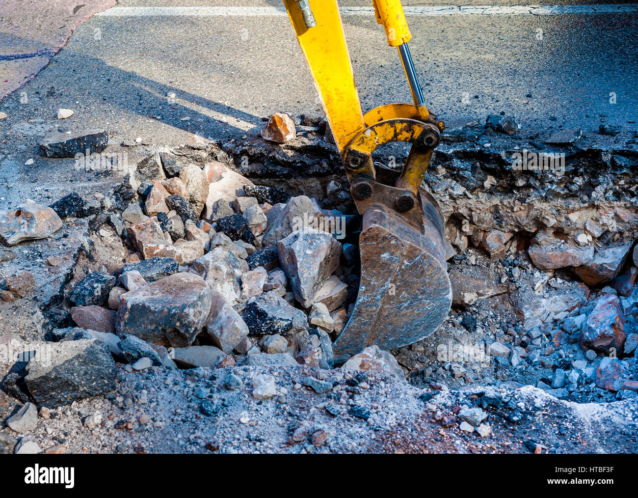 Working Excavator Tractor Digging street city Stock Photo - Alamy