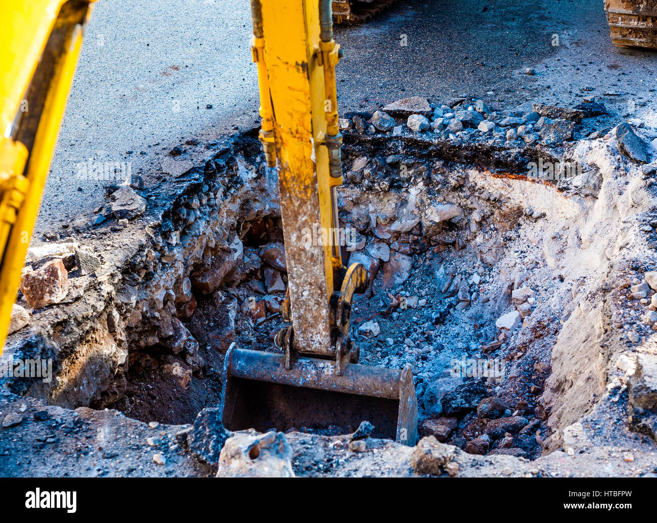 Working Excavator Tractor Digging street city Stock Photo - Alamy