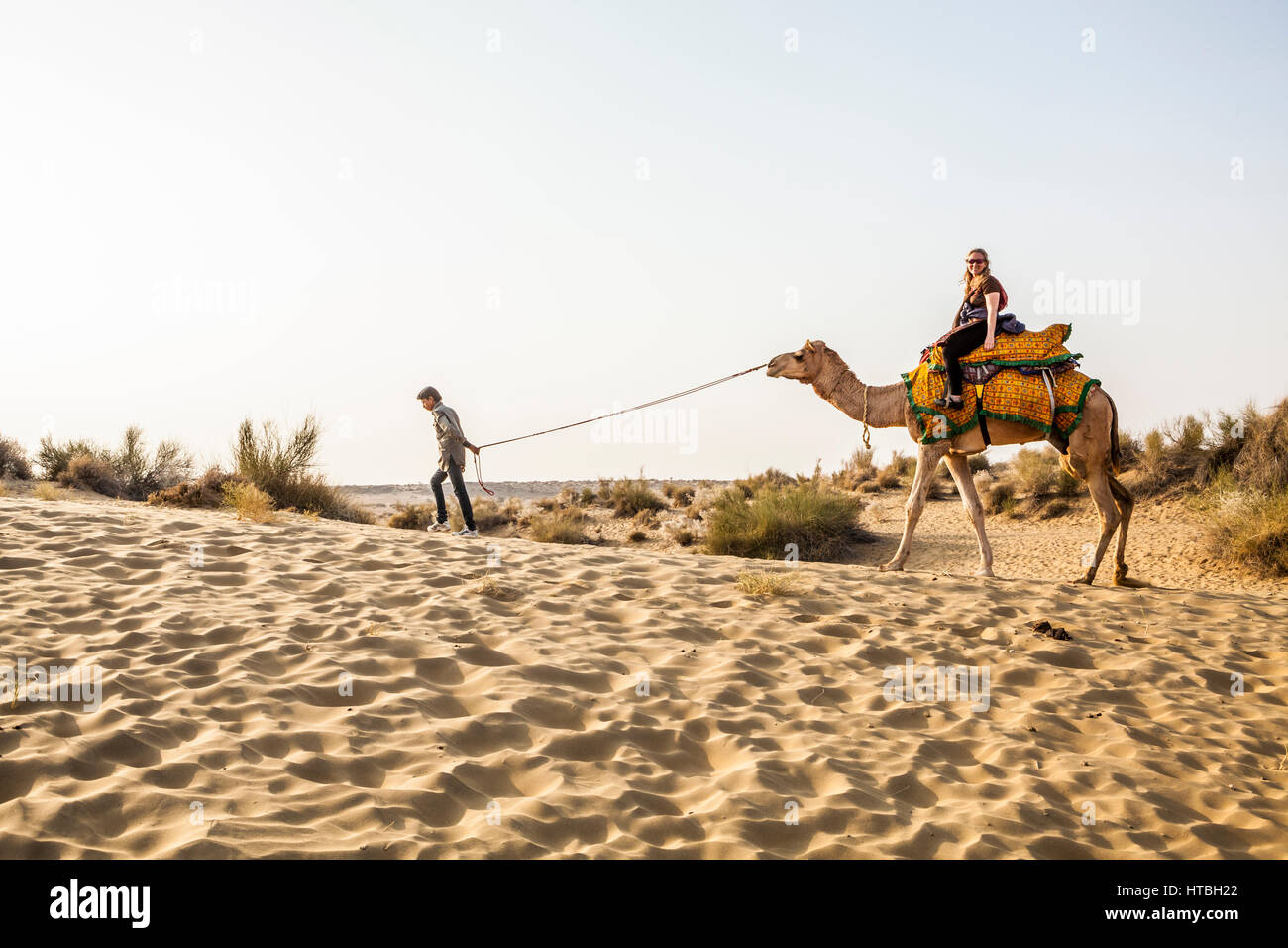 Caucasian woman riding camel hi-res stock photography and images - Alamy