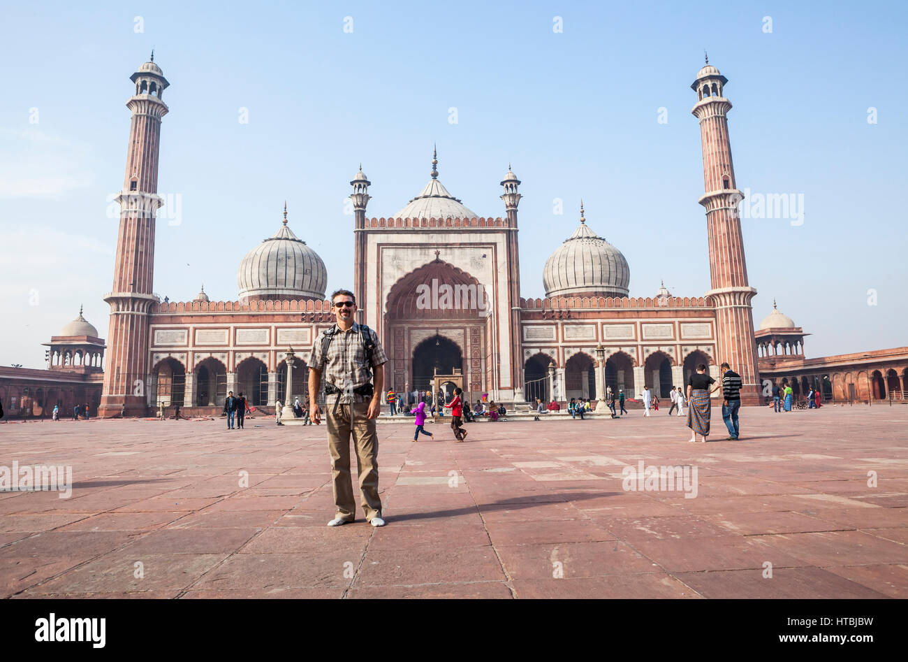 Male Tourist posing for picture in Jama Masjid mosque, in Delhi, India ...