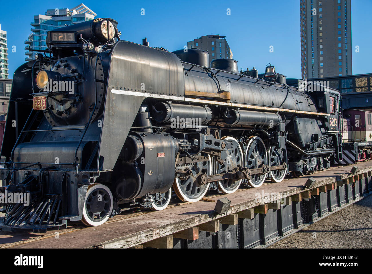 The Canadian National 6213 is a black steam engine 'Northern' type with ...