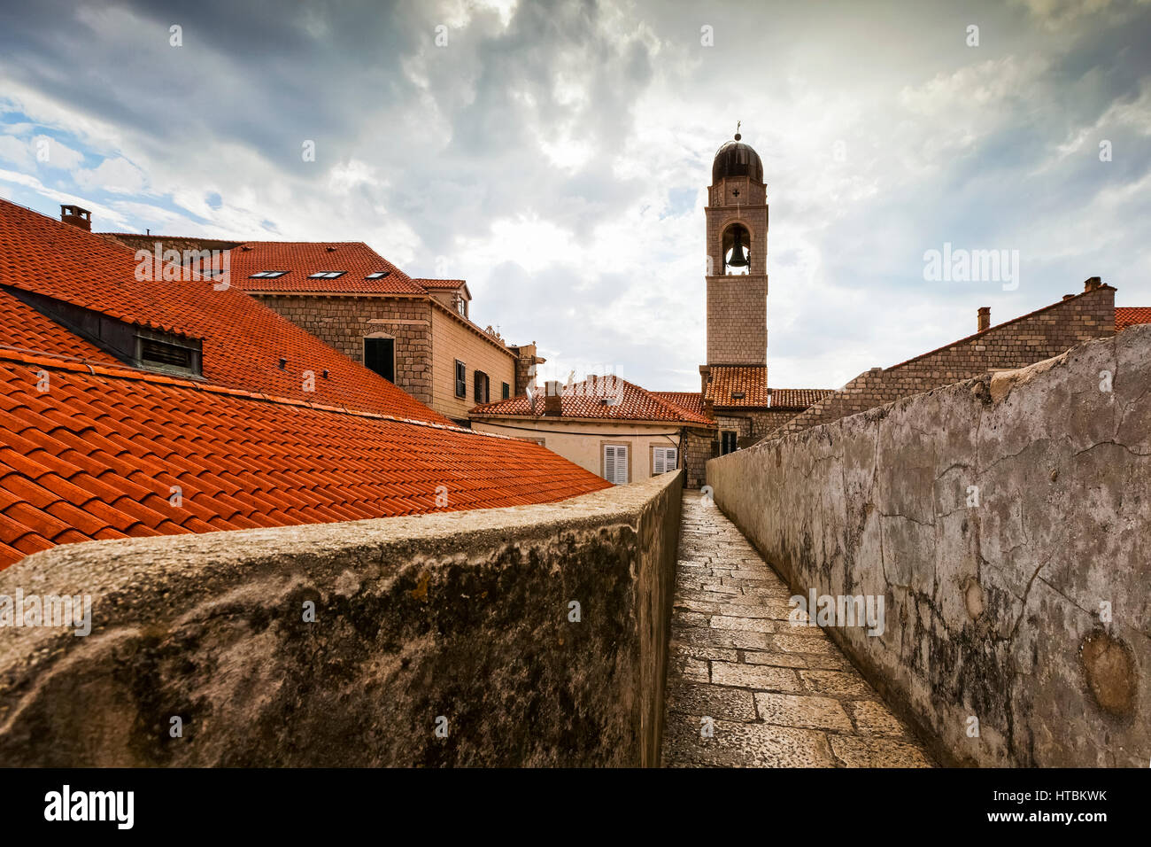 City walls and tower of the Franciscan Monastery; Dubrovnik, Croatia ...
