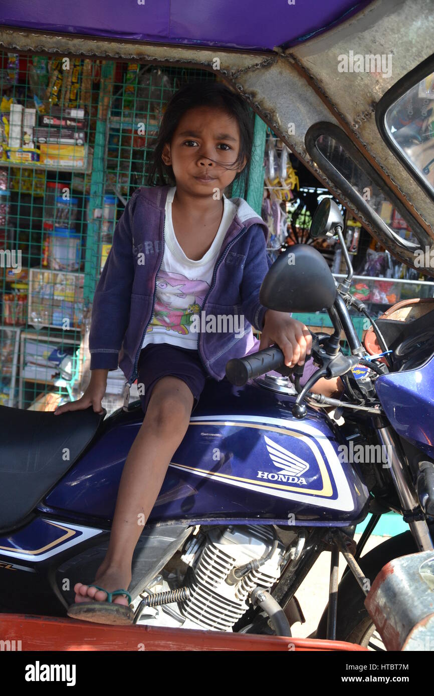 Very cute native kid on Palawan island, Philippines Stock Photo - Alamy