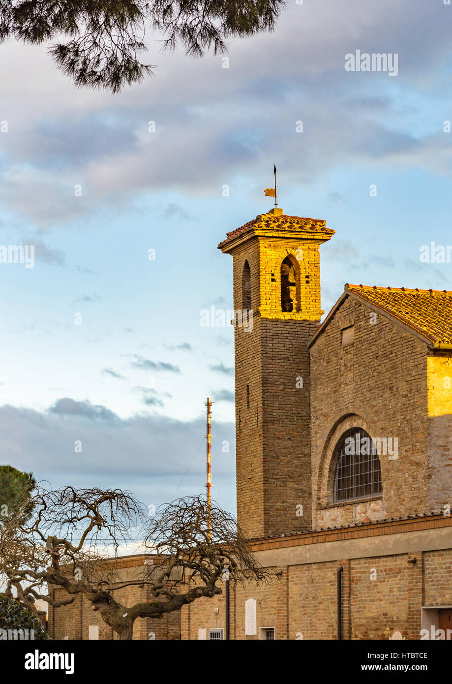 Ancient Catholic Church near chimney Stock Photo - Alamy