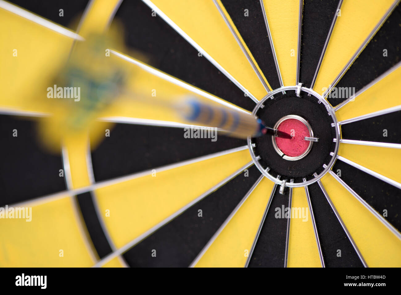 arrow hits bullseye as symbol for success Stock Photo - Alamy