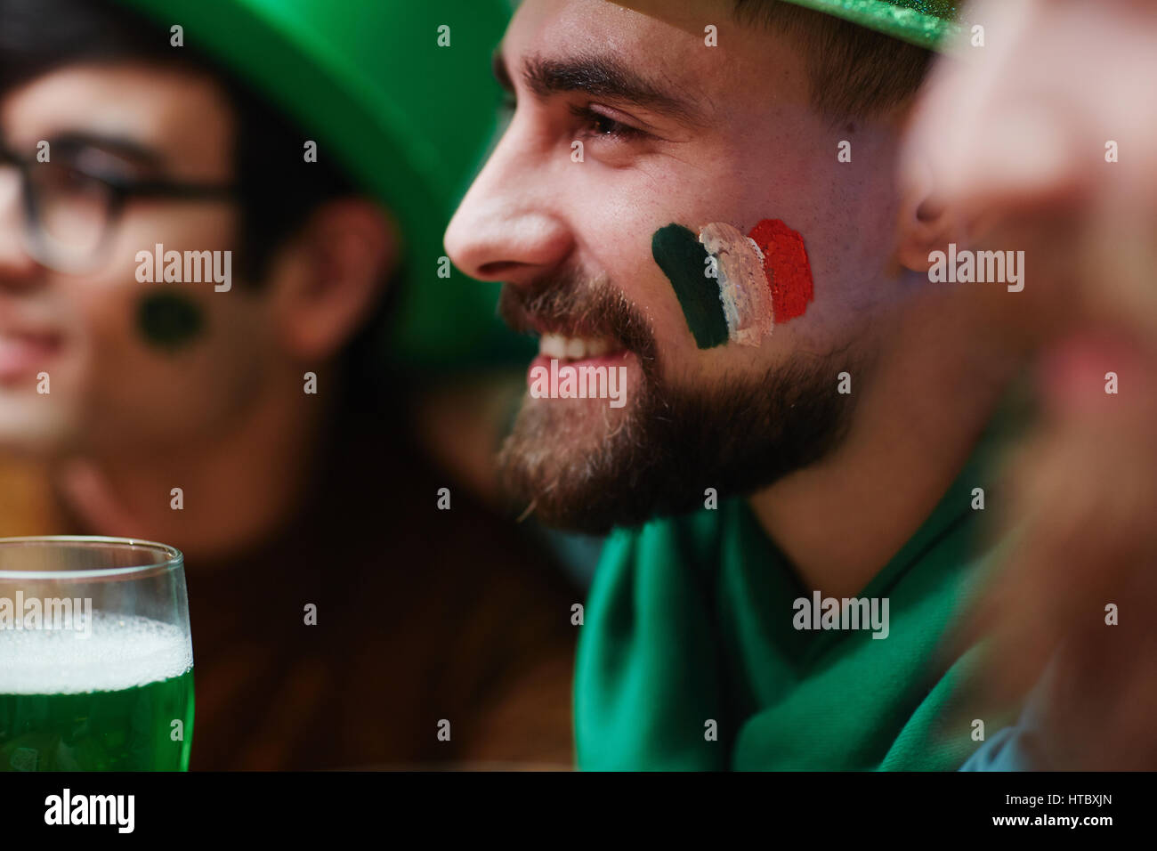 Smiley guy with symbol of irish flag on cheek Stock Photo - Alamy